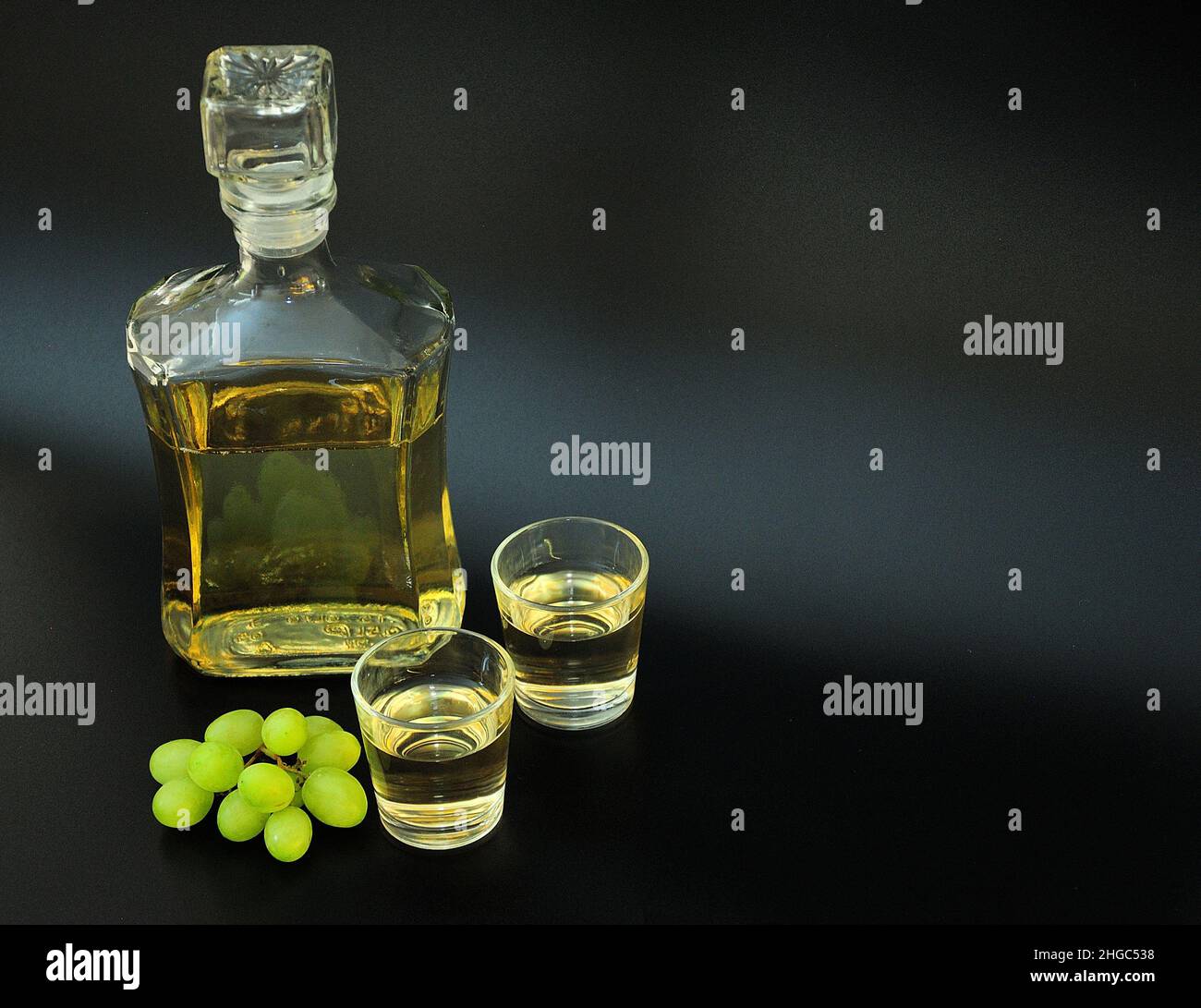 Grappa, traditional Italian alcohol made from white grapes, a glass ...