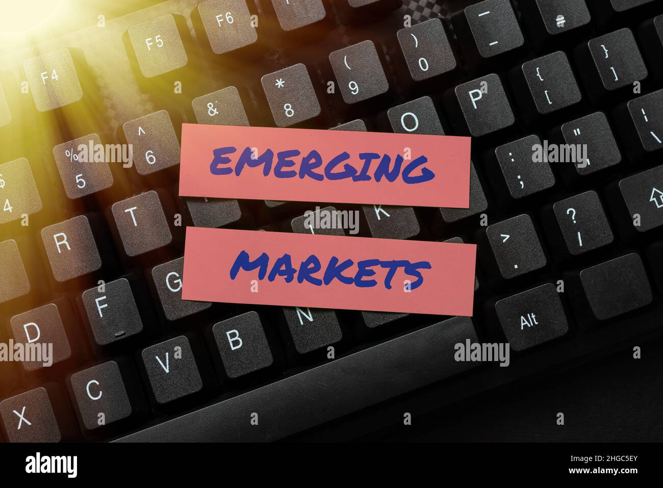 Hand writing sign Emerging Markets. Concept meaning nations that are ...