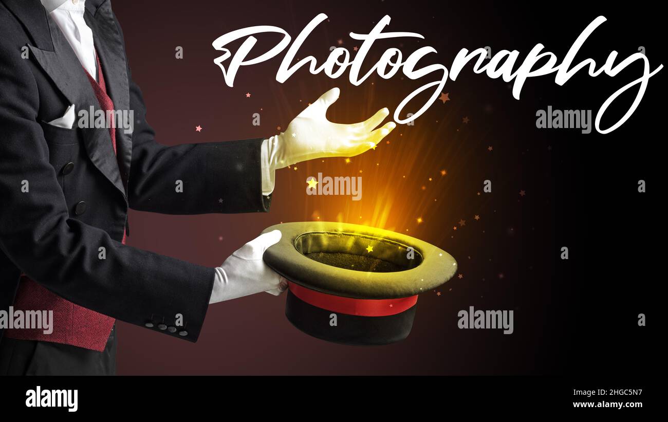 Old Magician is showing magic trick Stock Photo - Alamy
