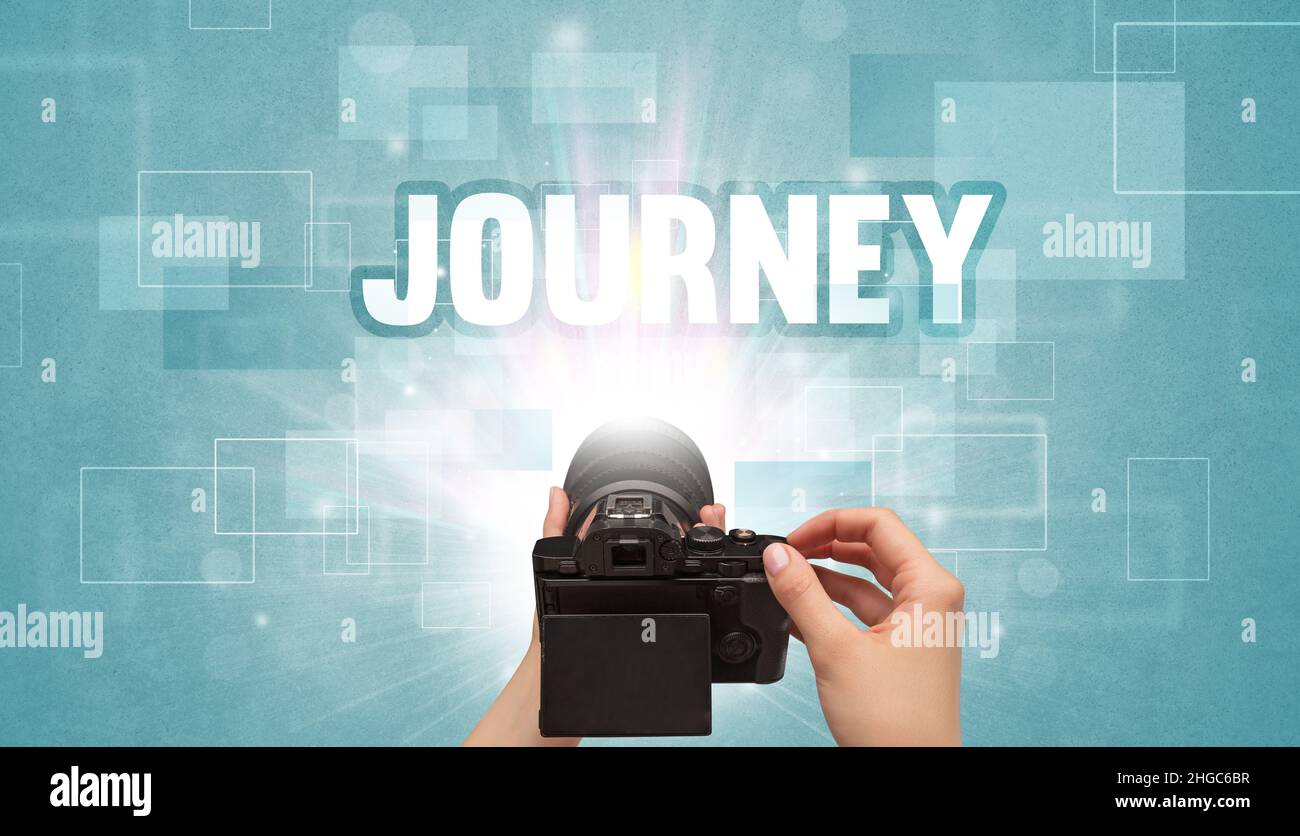 hand holding digital camera, traveling concept Stock Photo - Alamy