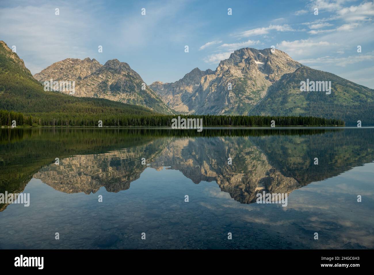 Reflections of Tetons Range and Trees in Leigh lake in Grand Teton ...