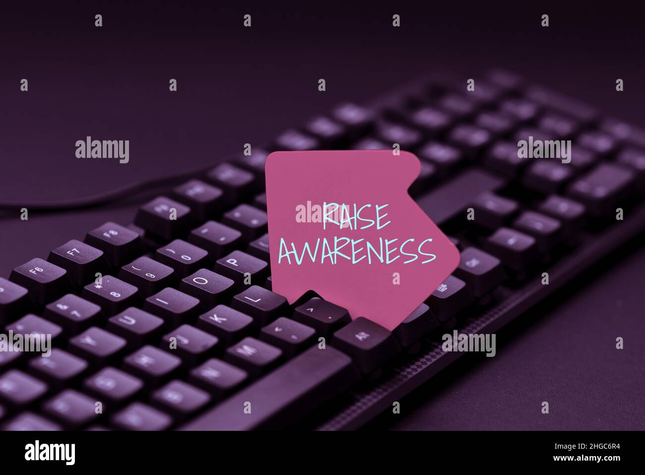 Hand writing sign Raise Awareness. Internet Concept creating a specific ...