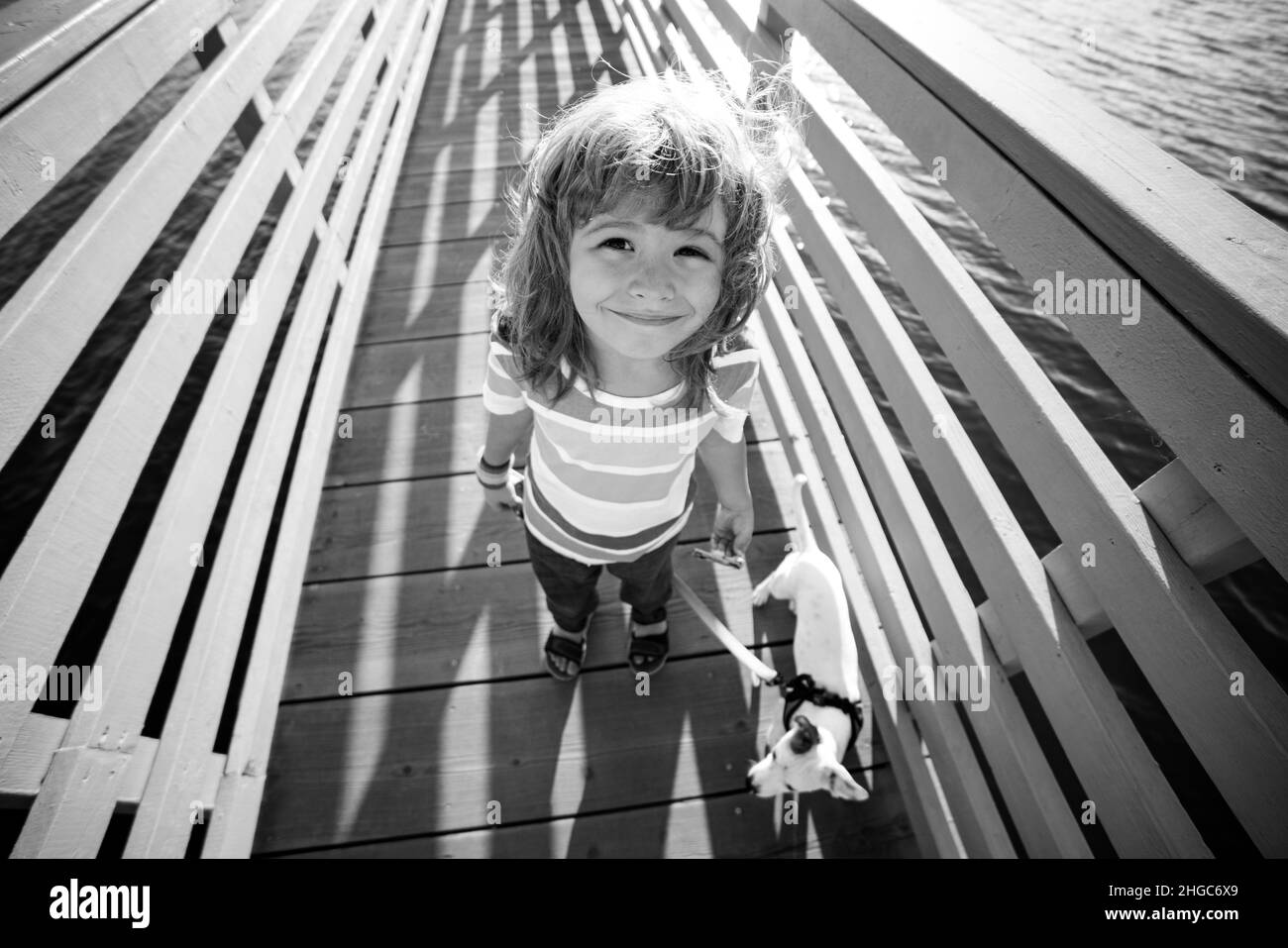 Walk dog child Black and White Stock Photos & Images - Alamy
