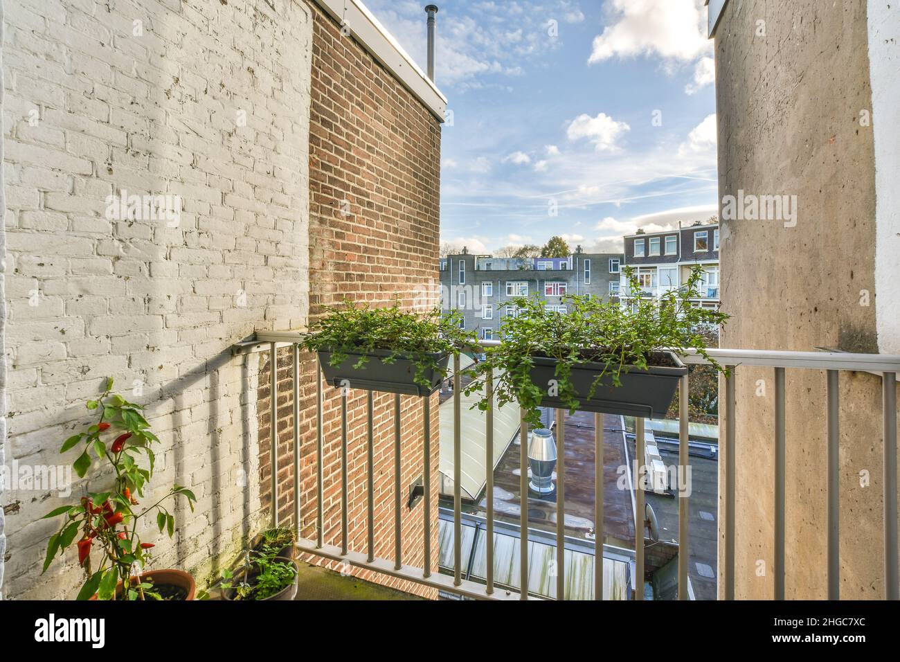 Balcony of a beautiful house in the daytime Stock Photo - Alamy