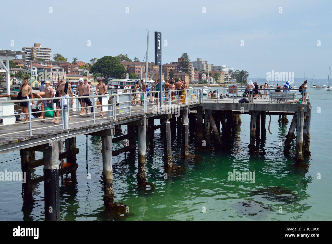 A group of people on a dock at Manly Wharf in Sydney, Australia Stock ...