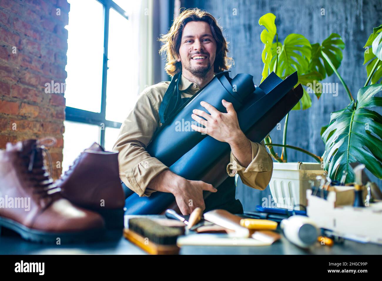 creating process of the leather things in the handmade workshop Stock ...