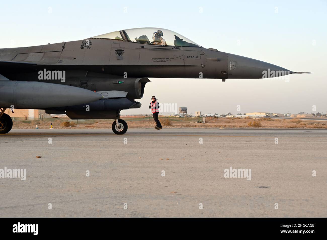332nd Air Expeditionary Wing Airmen perform a hot-pit maintenance check ...