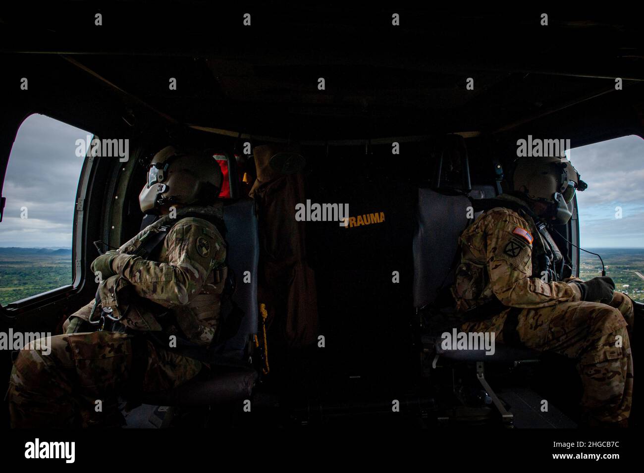 Members of Charlie Company, 1st Battalion, 228th Aviation Regiment scan ...