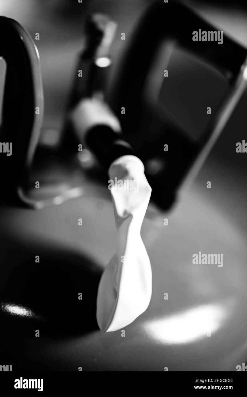 Selective focus on edge of an inflatable balloon attached to a helium ...