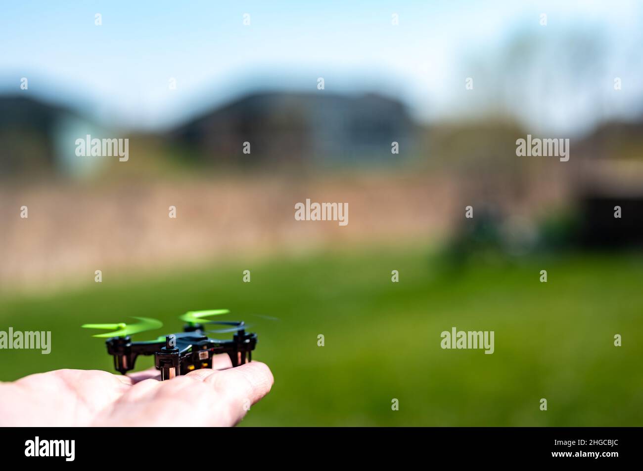 Miniature toy remote controlled drone taking off from a hand Stock ...