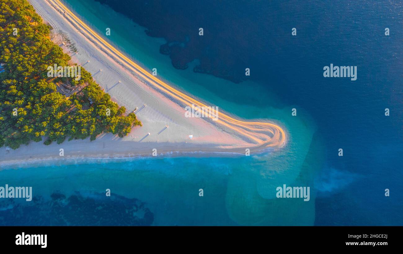 Aerial vertical drone view of Zlatni Rat cape on Brac island in Croatia ...