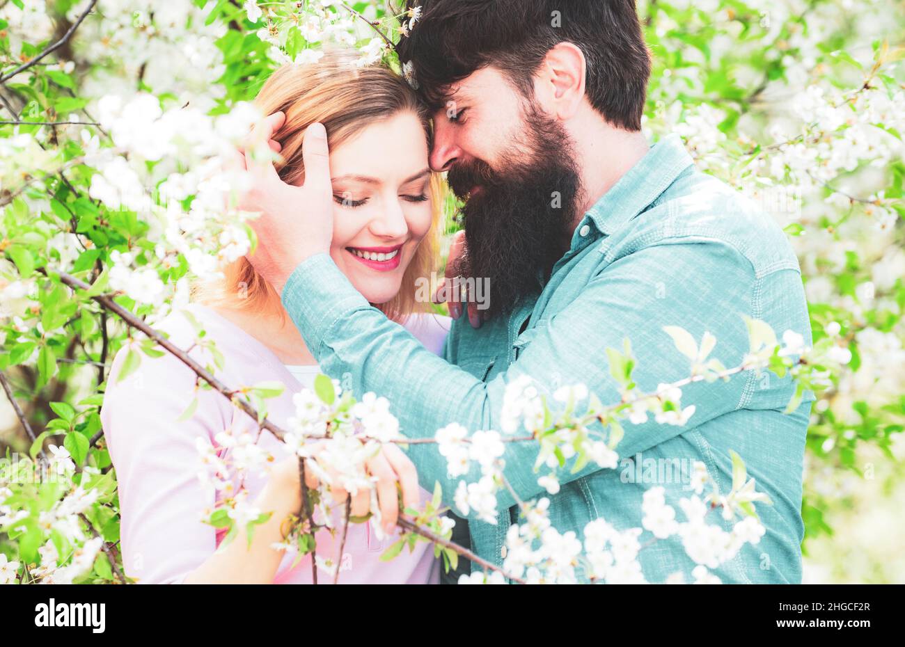 Easter couple, Spring couple laughing and hugging. Young happy couple ...