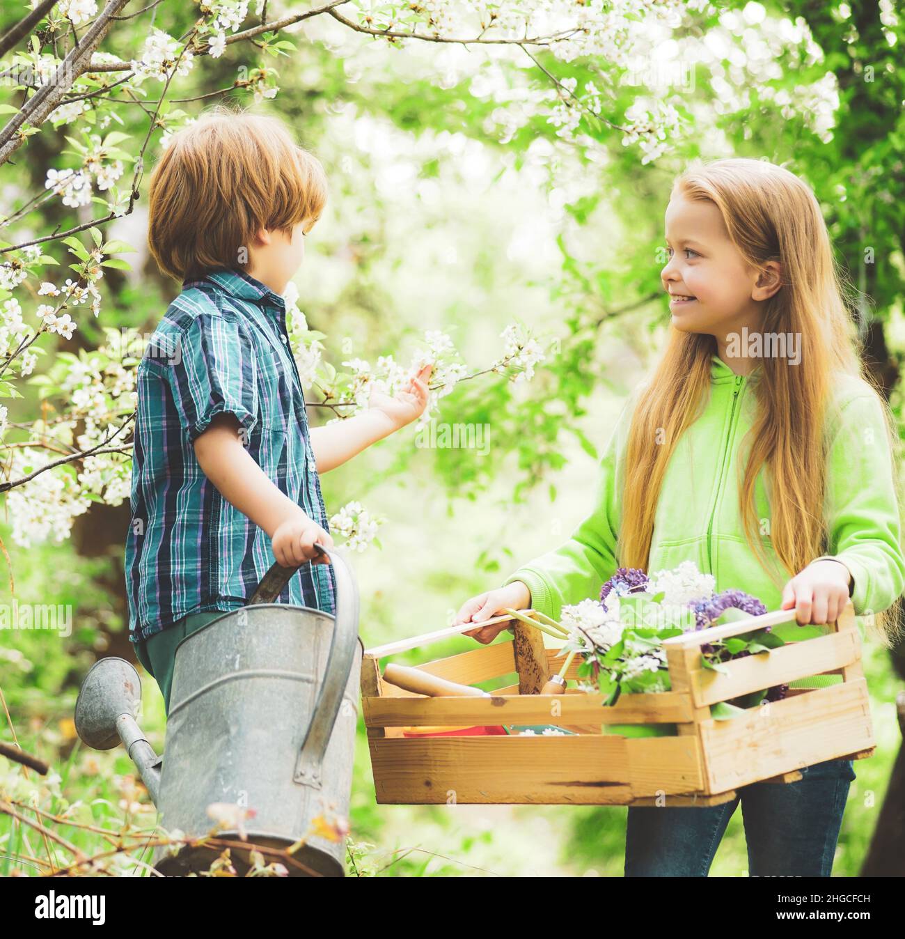 Farming and agriculture cultivation. Two young farmers. sweet childhood ...