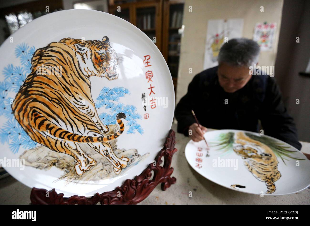 HANDAN, CHINA - JANUARY 20, 2022 - A worker of a ceramic enterprise ...
