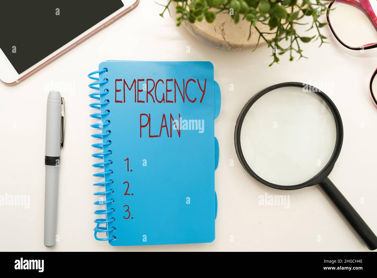 Hand writing sign Emergency Plan. Word Written on instructions that ...