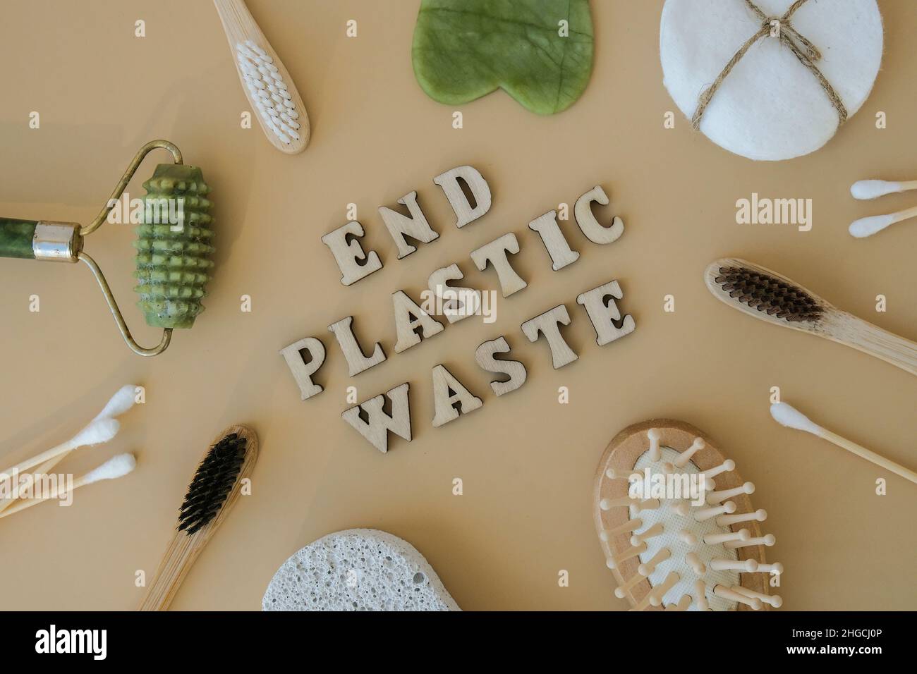 END PLASTIC WASTE text around Natural skin care products on neutral ...