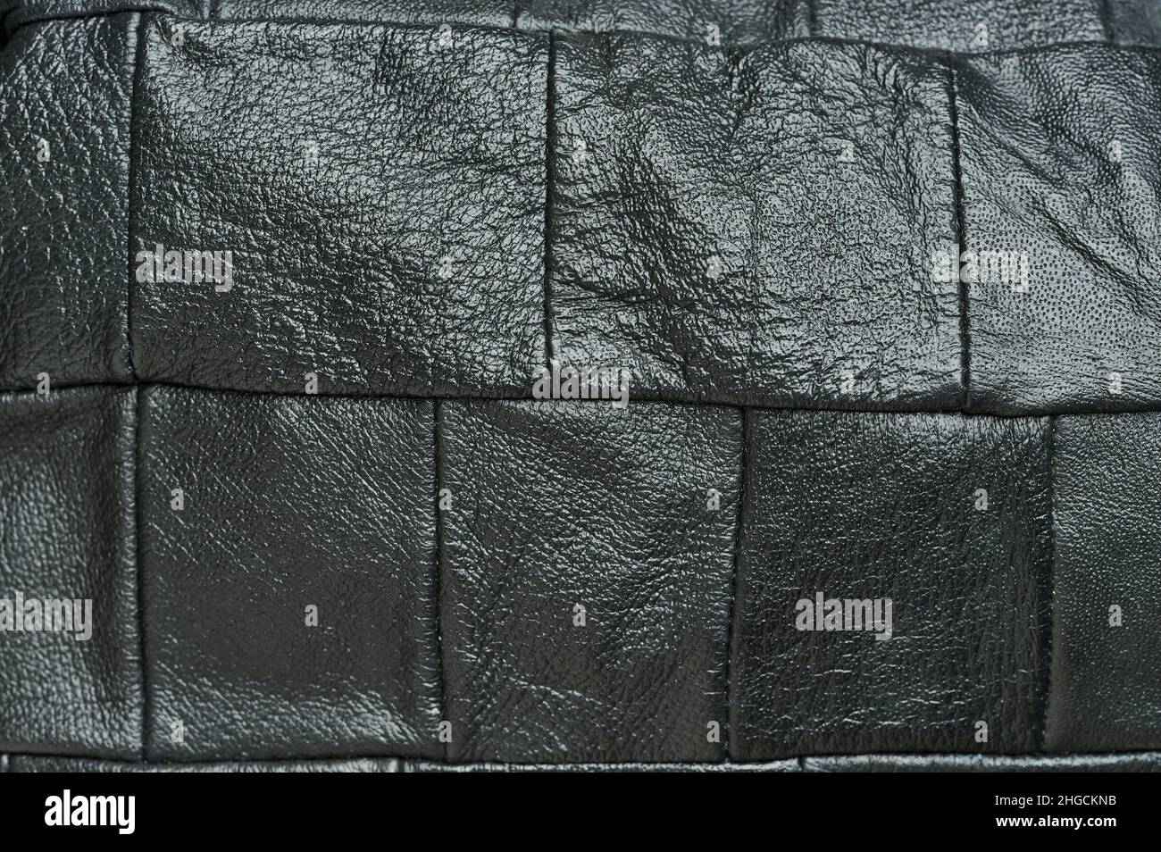 Black shiny leather texture hi-res stock photography and images - Alamy