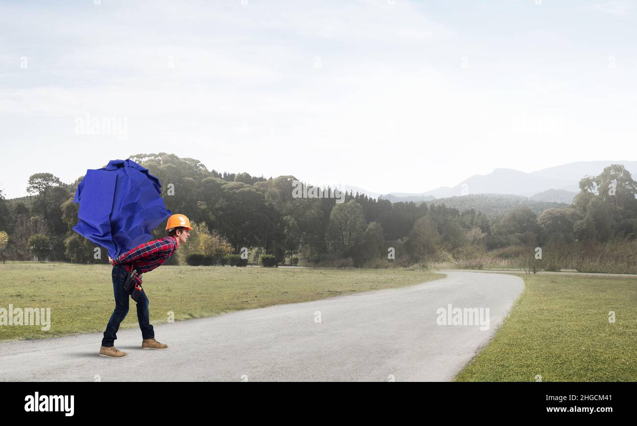 Engineer man carry load Stock Photo - Alamy