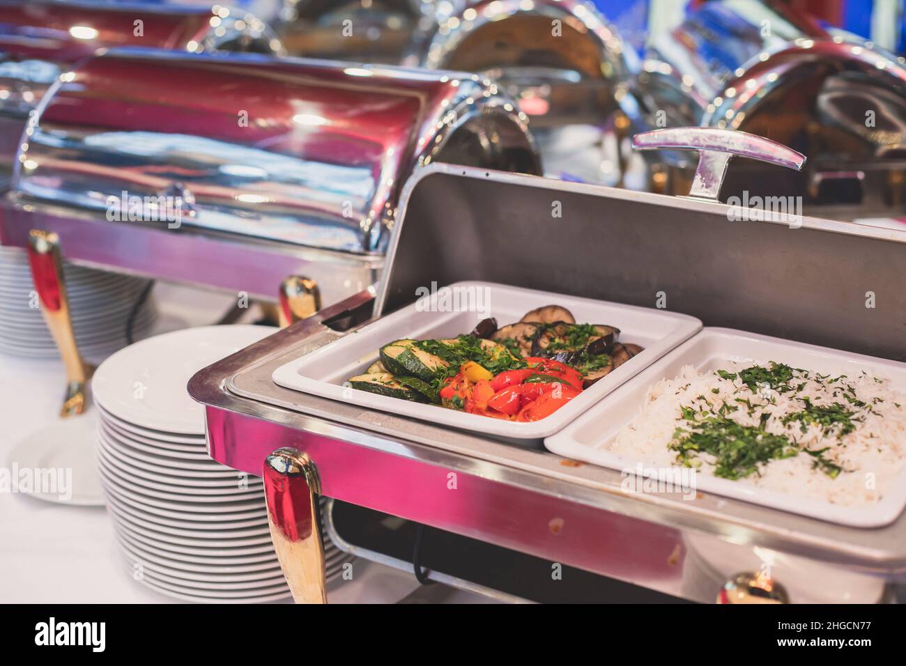Beautifully decorated catering banquet table with different main course ...
