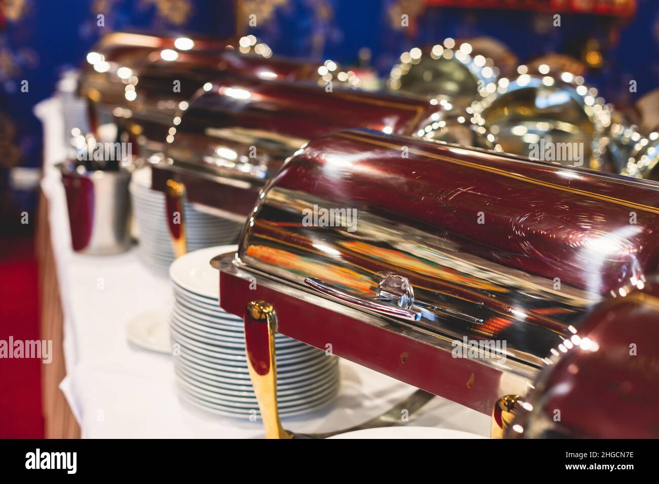 Beautifully decorated catering banquet table with different main course ...