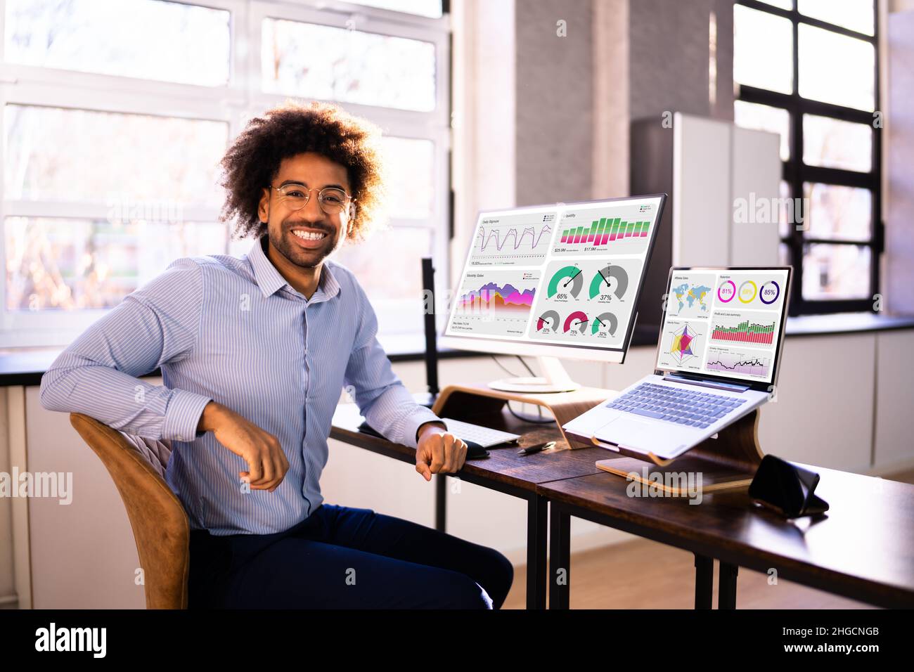 African American Business Man Analyst Using Data Analytics Stock Photo ...