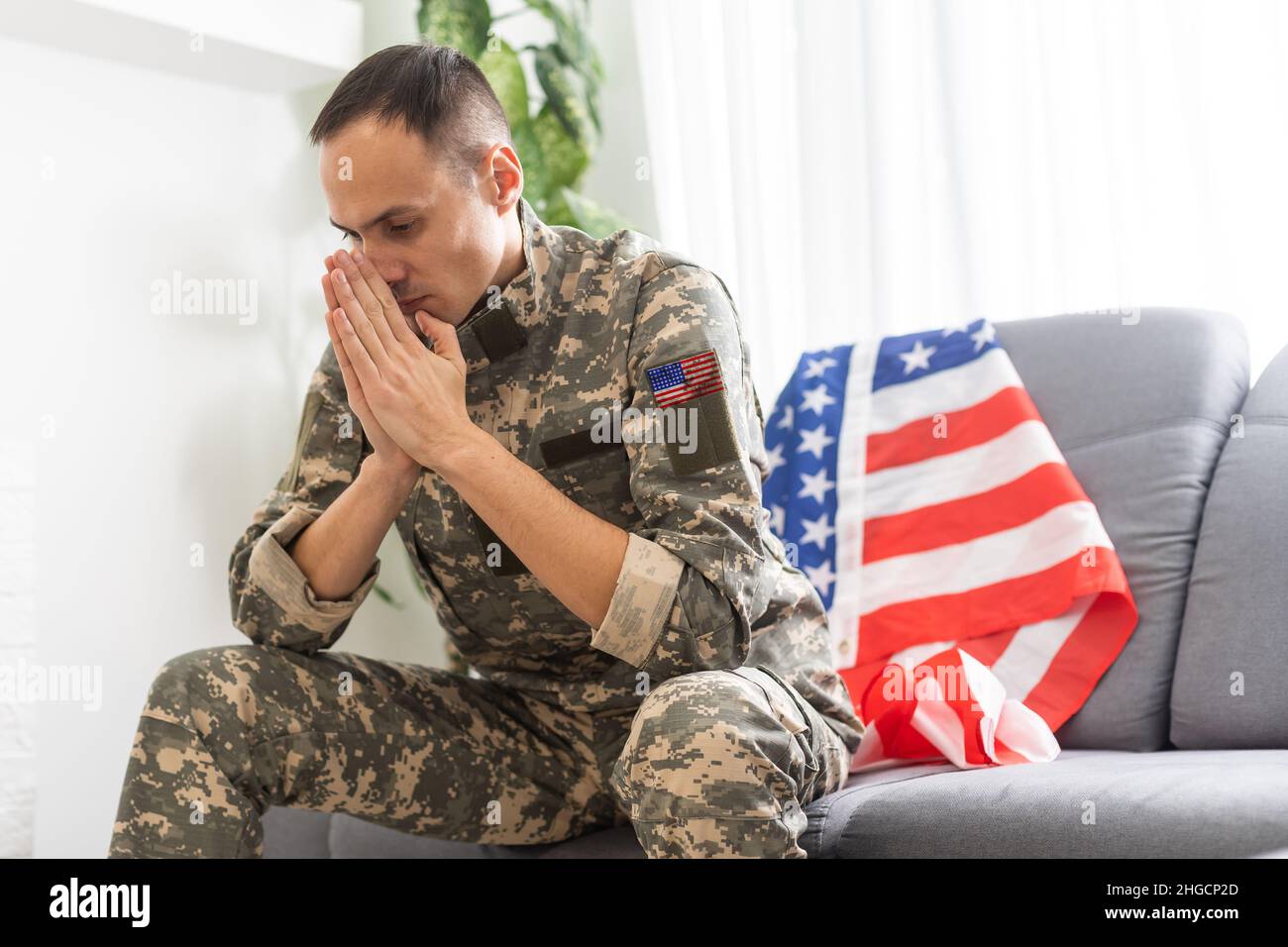 Portrait of middle aged sad, desperate military man. Disabled soldier ...