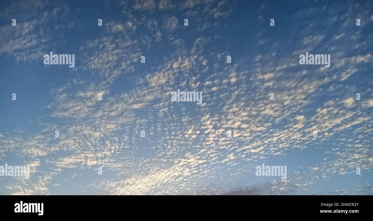 Clean Blue Sky Background With Lots Of Clouds Stock Photo - Alamy