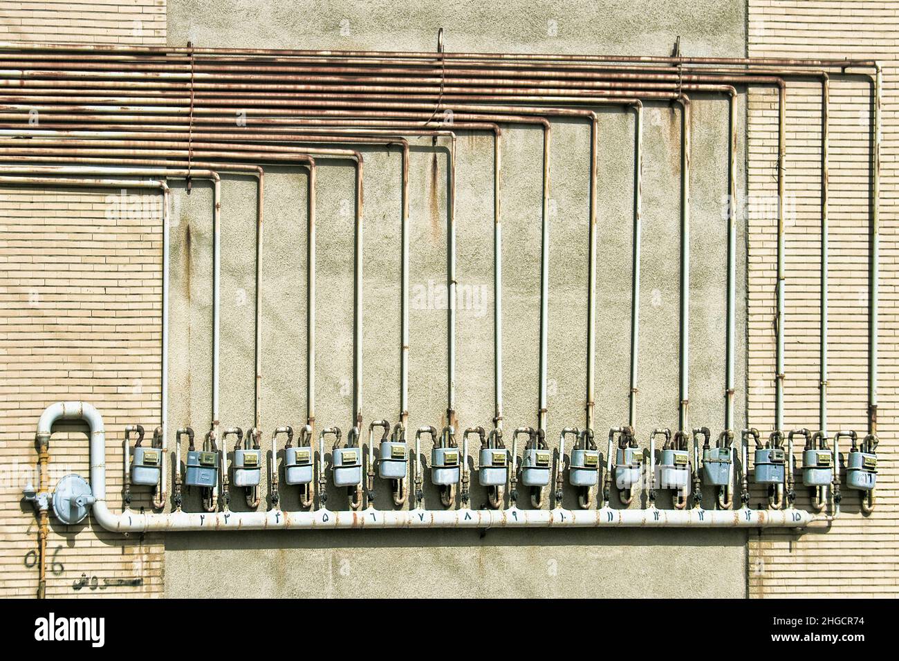 gas pipes on the wall of the building Stock Photo - Alamy