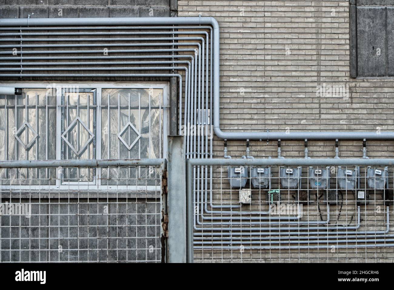 gas pipes on the wall of the building Stock Photo - Alamy