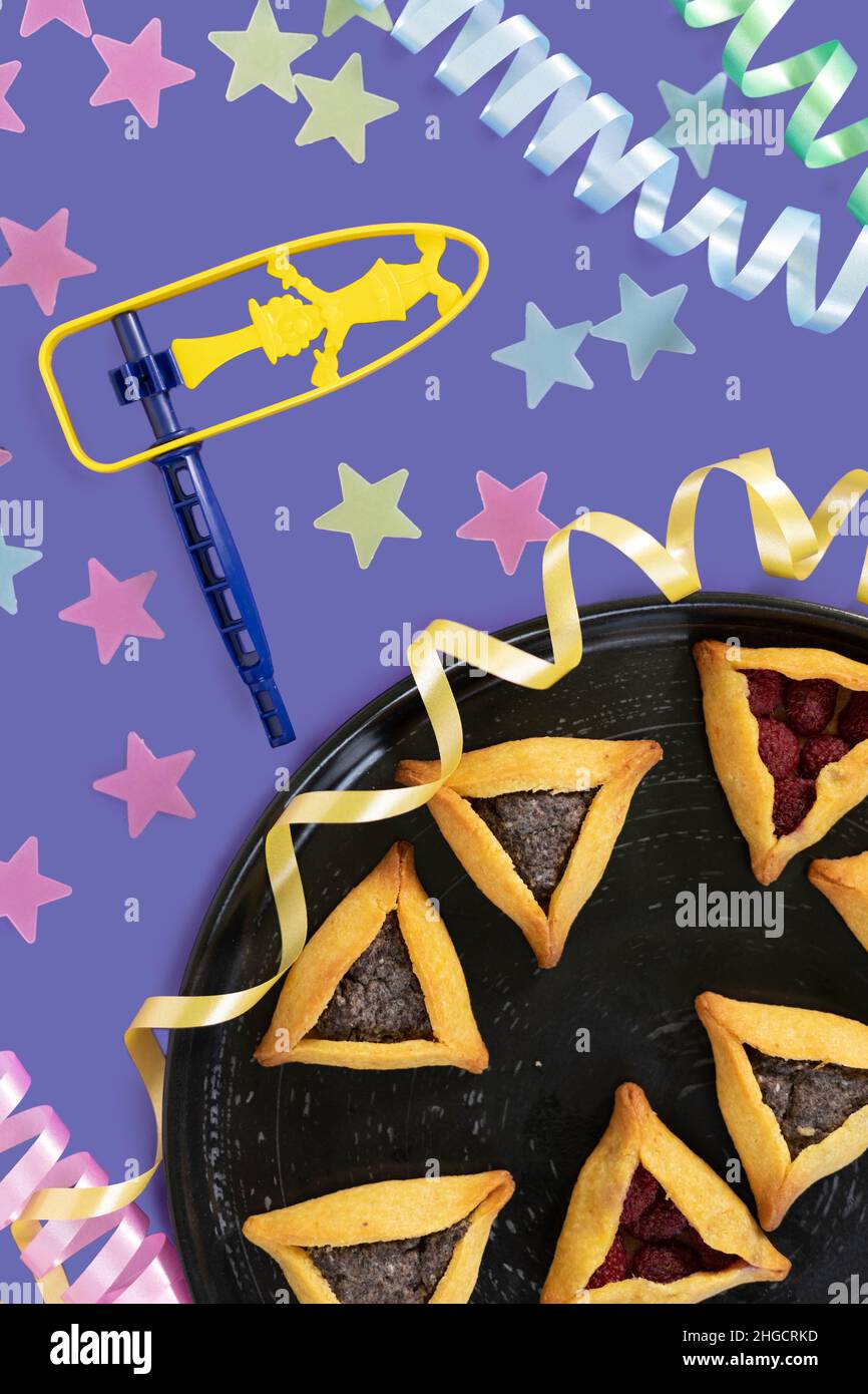 Traditional Purim pastry Jewish triangular hamantashen cookies stuffed ...