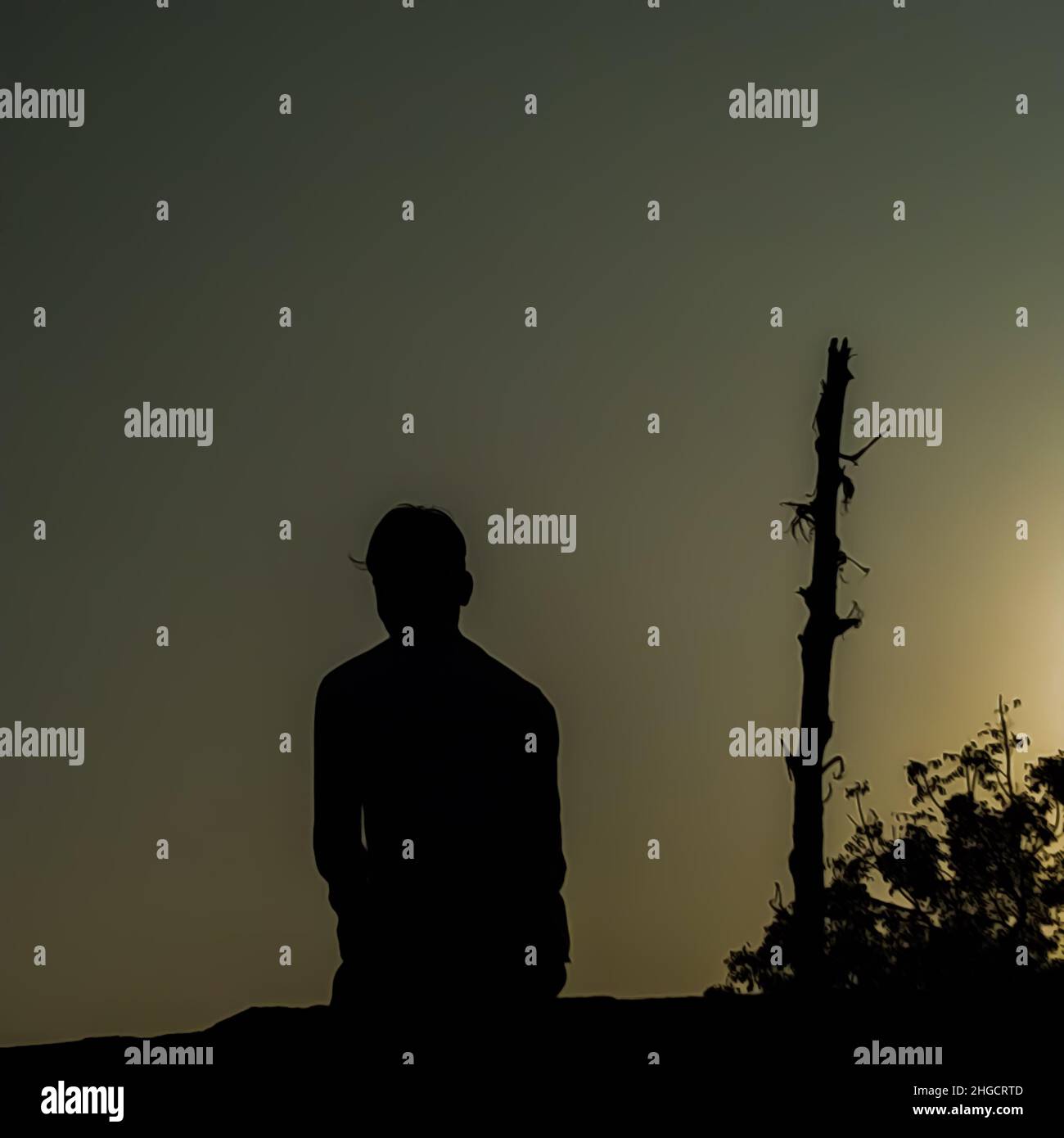 Sitting alone in seashore hi-res stock photography and images - Alamy