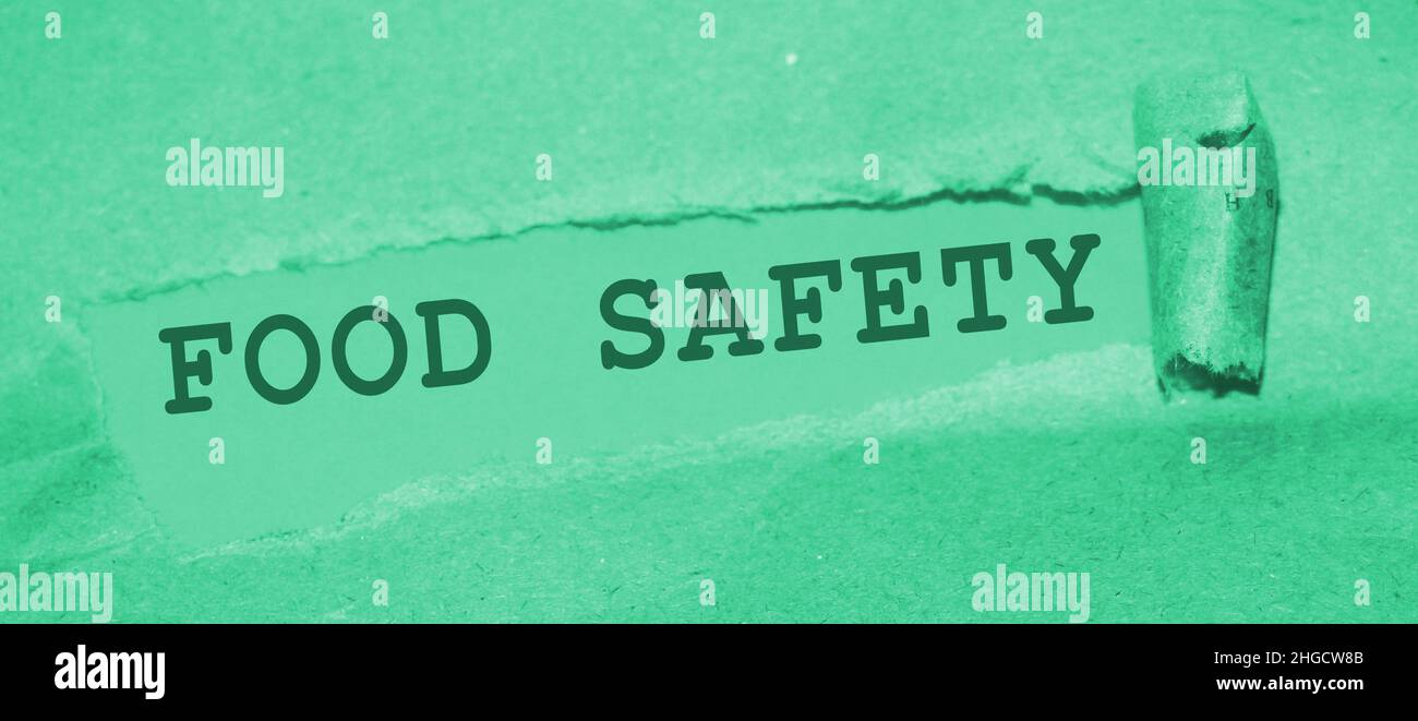 Food Safety words written under torn paper. Healthcare healthy diet ...