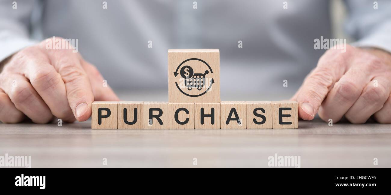 Wooden blocks with symbol of purchase concept Stock Photo - Alamy
