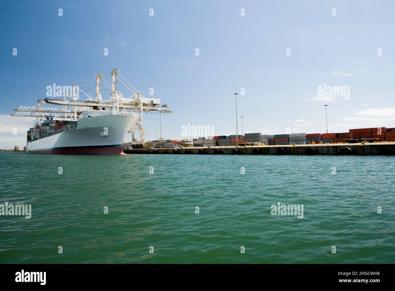Cargo ship moored in commercial harbor in Cape Town, South Africa ...