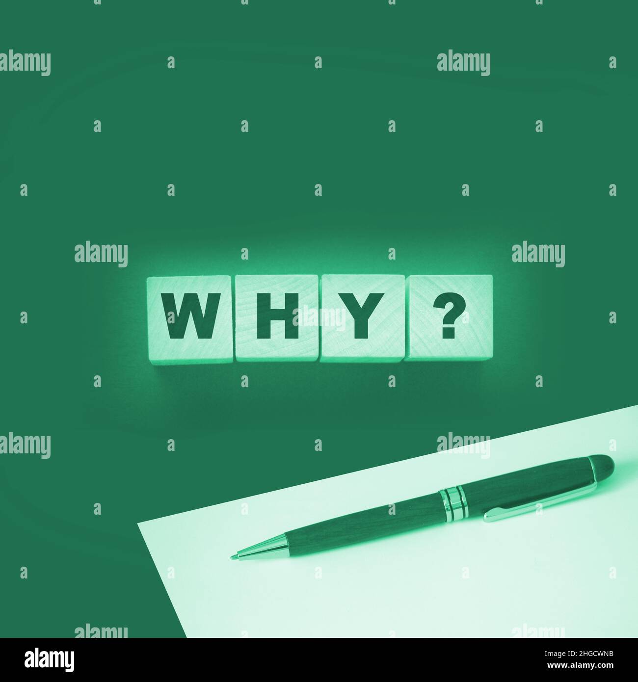 Why Closeup of word with question mark on wooden cubes on dark grey ...