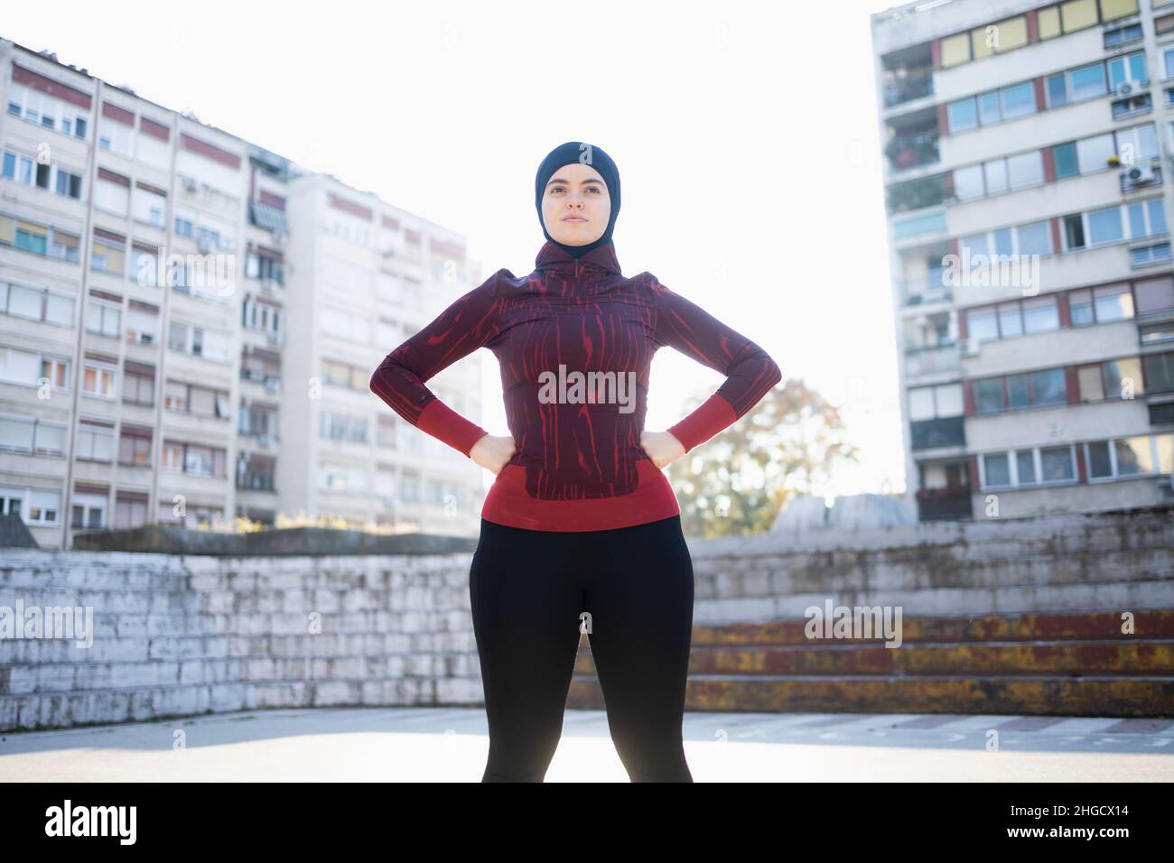 Determined Muslim female standing firmly Stock Photo - Alamy