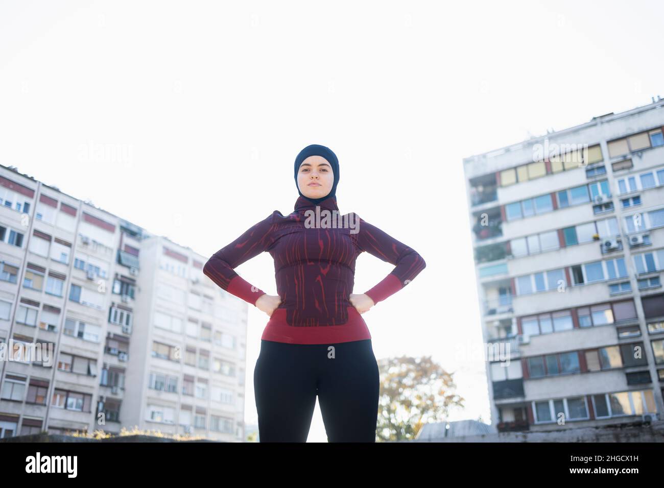 Strong Muslim female standing determinedly in the streets Stock Photo ...
