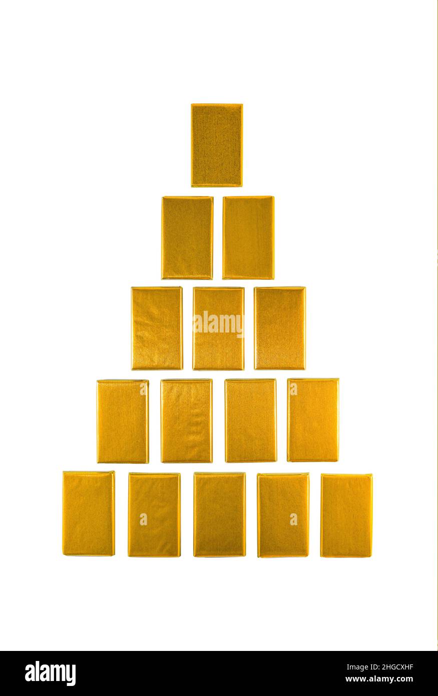 Gold bars laid with a pyramid. Isolated on a white background Stock Photo - Alamy