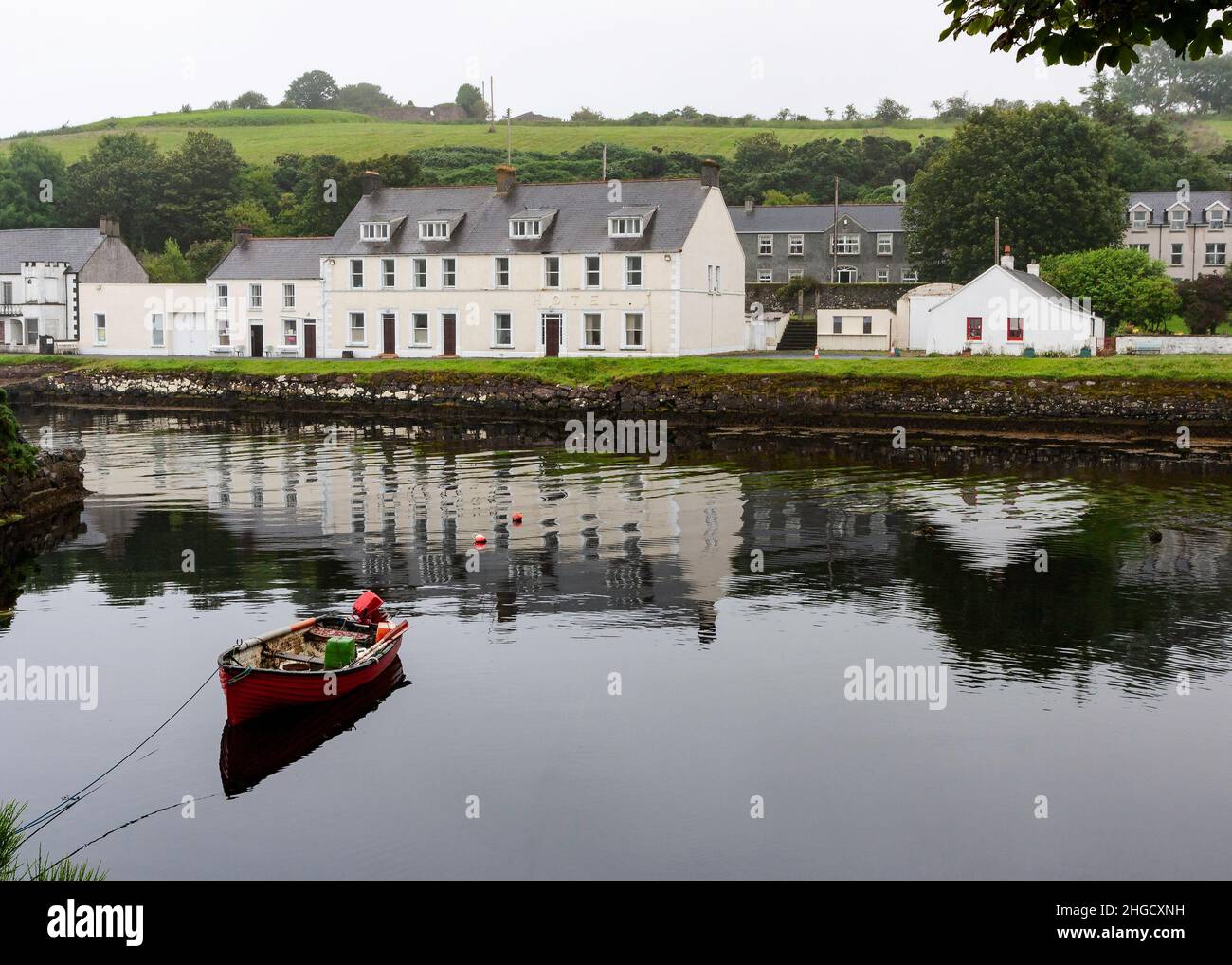 View of the Cushendun bay in a foggy morning Stock Photo - Alamy