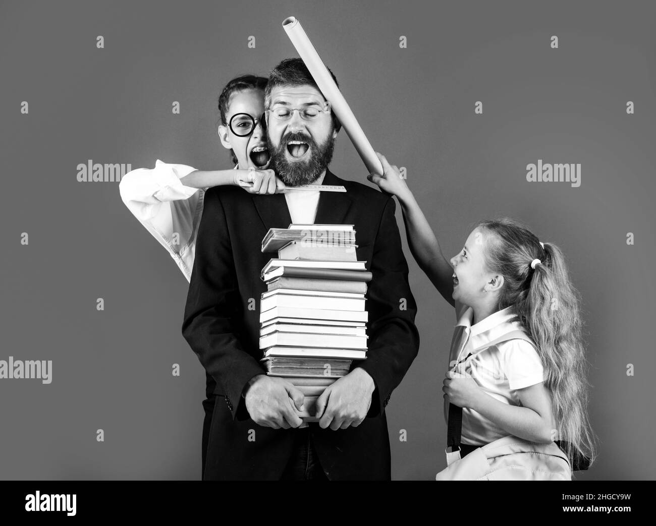 Funny portrait of comic father tutor and crazy students schoolkids on ...