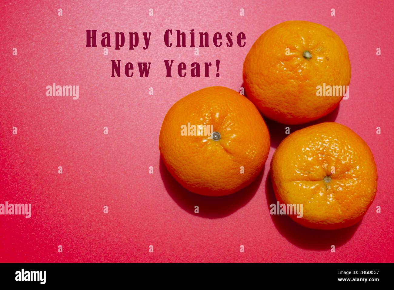 Concept image of the chinese new year - Mandarin orange on red ...