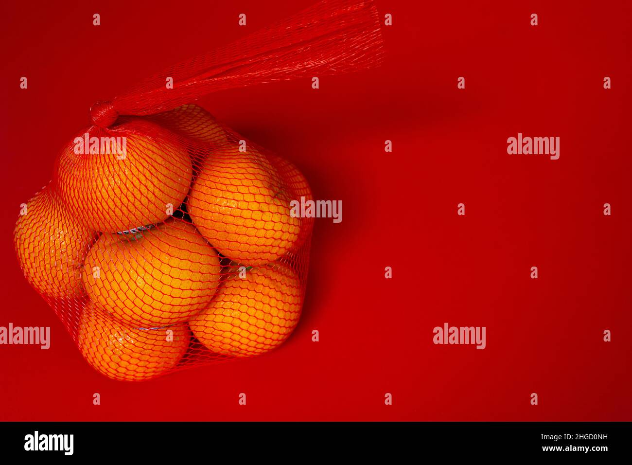 Concept image of the chinese new year. Mandarin orange on red ...