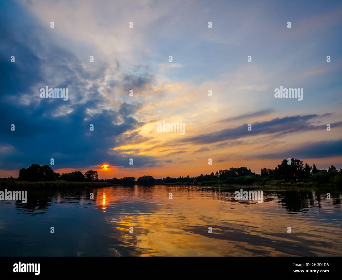 Cloudscape over river in hi-res stock photography and images - Alamy