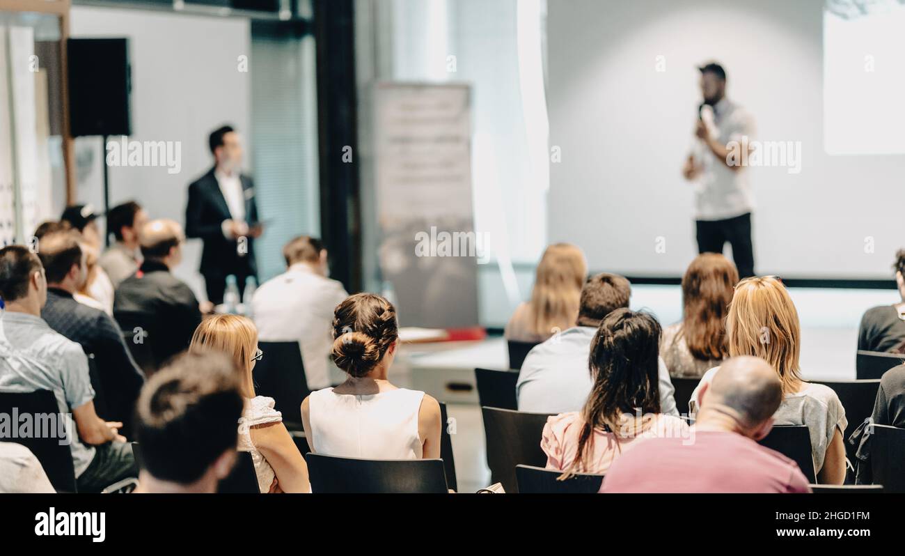 Business speaker giving a talk at business conference event Stock Photo ...