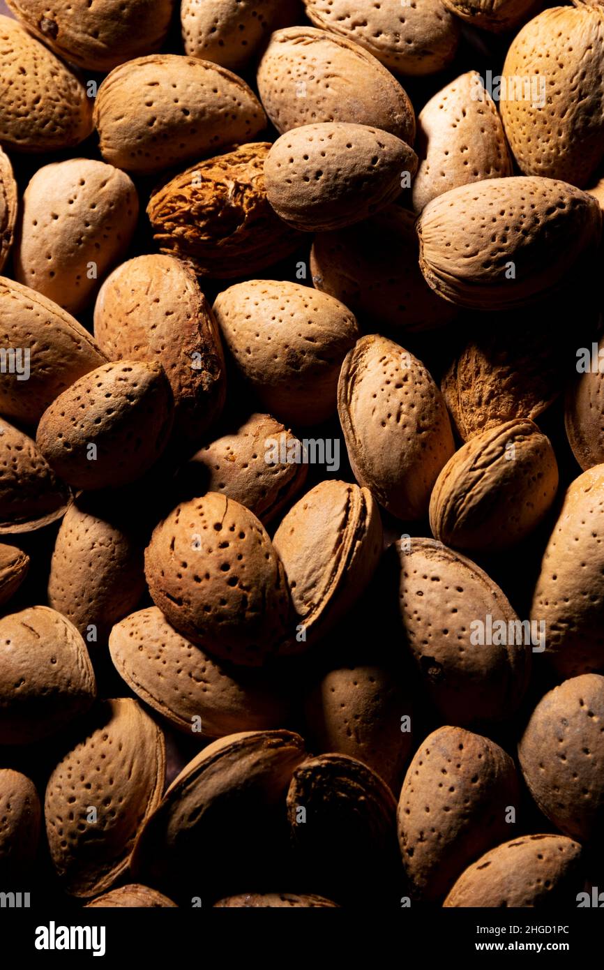 Close up of whole almonds, protein rich ingredients, healthy eating ...