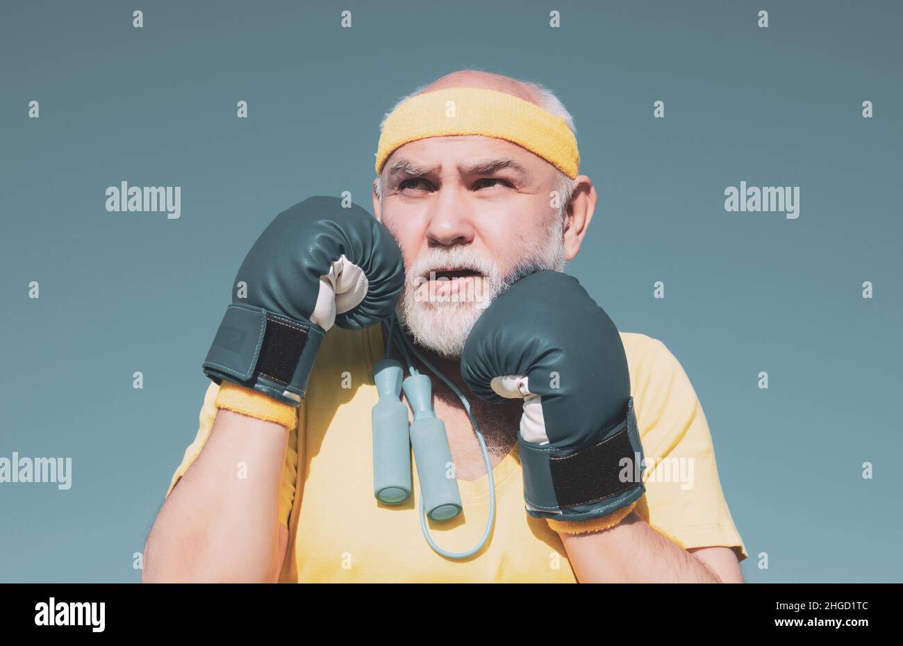 Grandfather doing boxing training hi-res stock photography and images ...