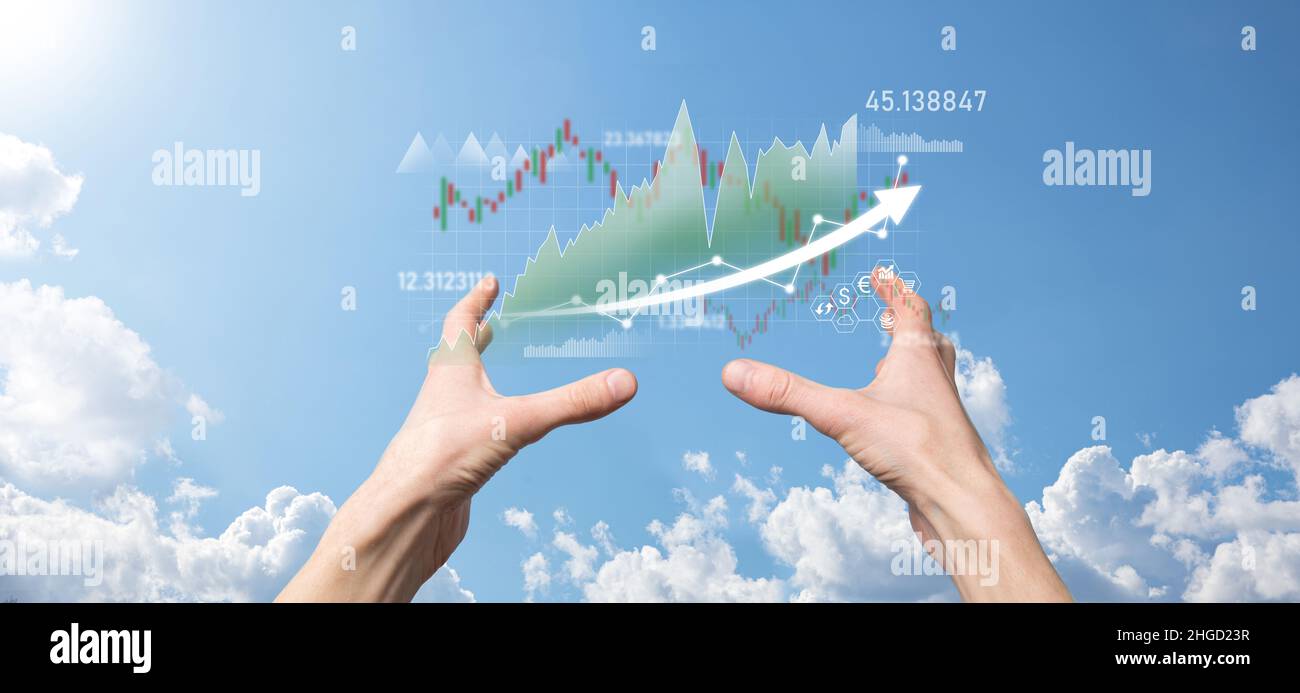 Hand hold sales data and economic growth graph chart. Business planning ...