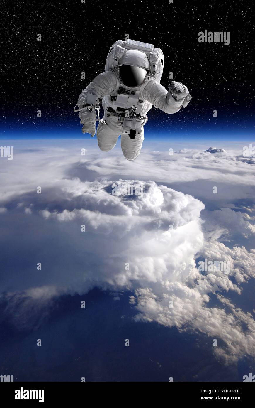 Astronaut in outer open space over the planet Earth.Stars provide ...