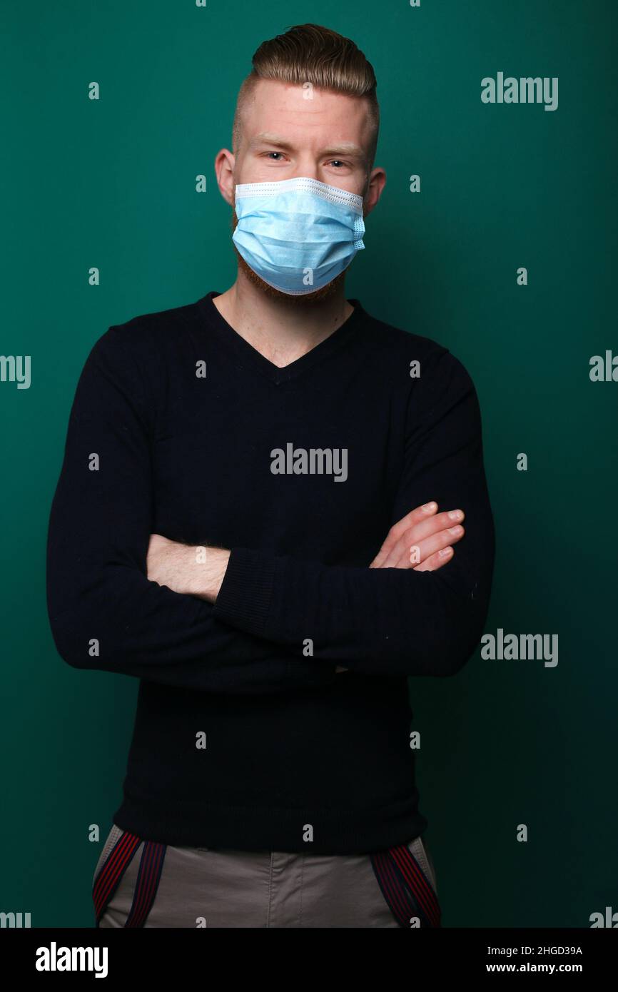 Beautiful man wearing a mouth mask Stock Photo - Alamy