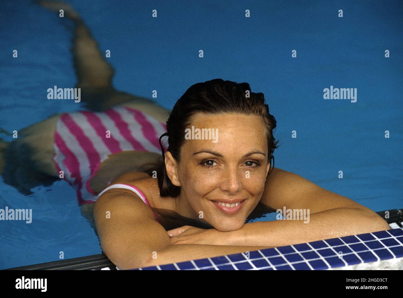 pretty dark hair portrait young woman smiiing face looking front camera ...